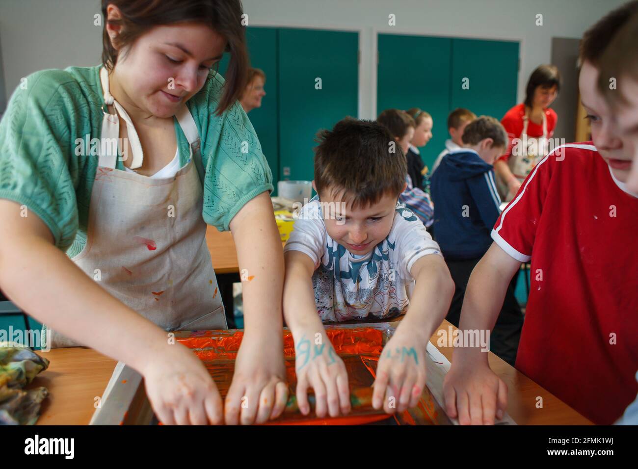 Junior School Art lesson screen printing Stock Photo - Alamy