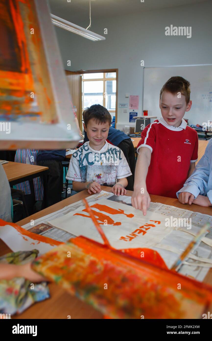 Junior School Art lesson screen printing Stock Photo - Alamy