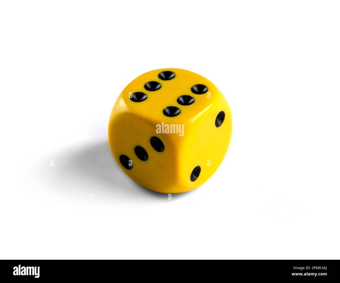 Yellow dice isolated on white background. Top view Stock Photo - Alamy