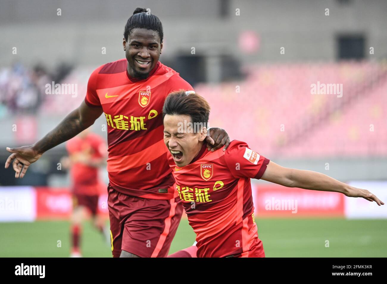 Suzhou China s Jiangsu Province. 10th May 2021. Hu Rentian R of Hebei FC celebrates during the 4th round match between Shanghai Shenhua and Hebei FC at the 2021 season Chinese Football Association