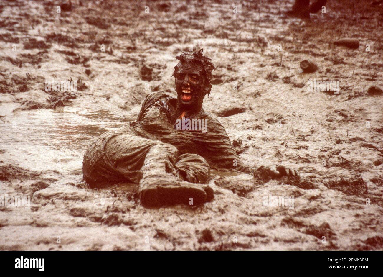 Muddy girl at Glastonbury Festival 1998, Worthy Farm, Somerset, England ...
