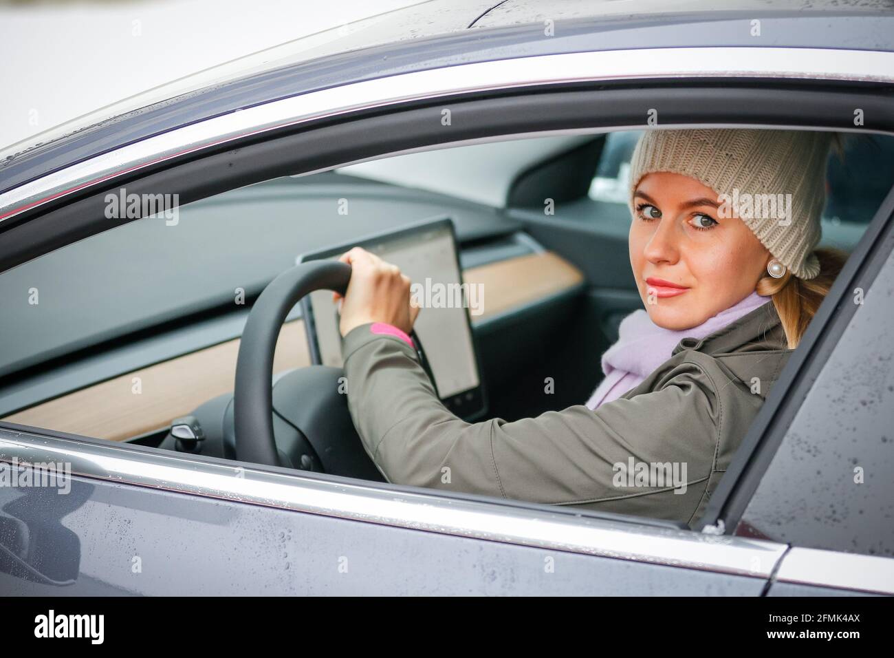 Beautiful woman electric car hi-res stock photography and images - Alamy