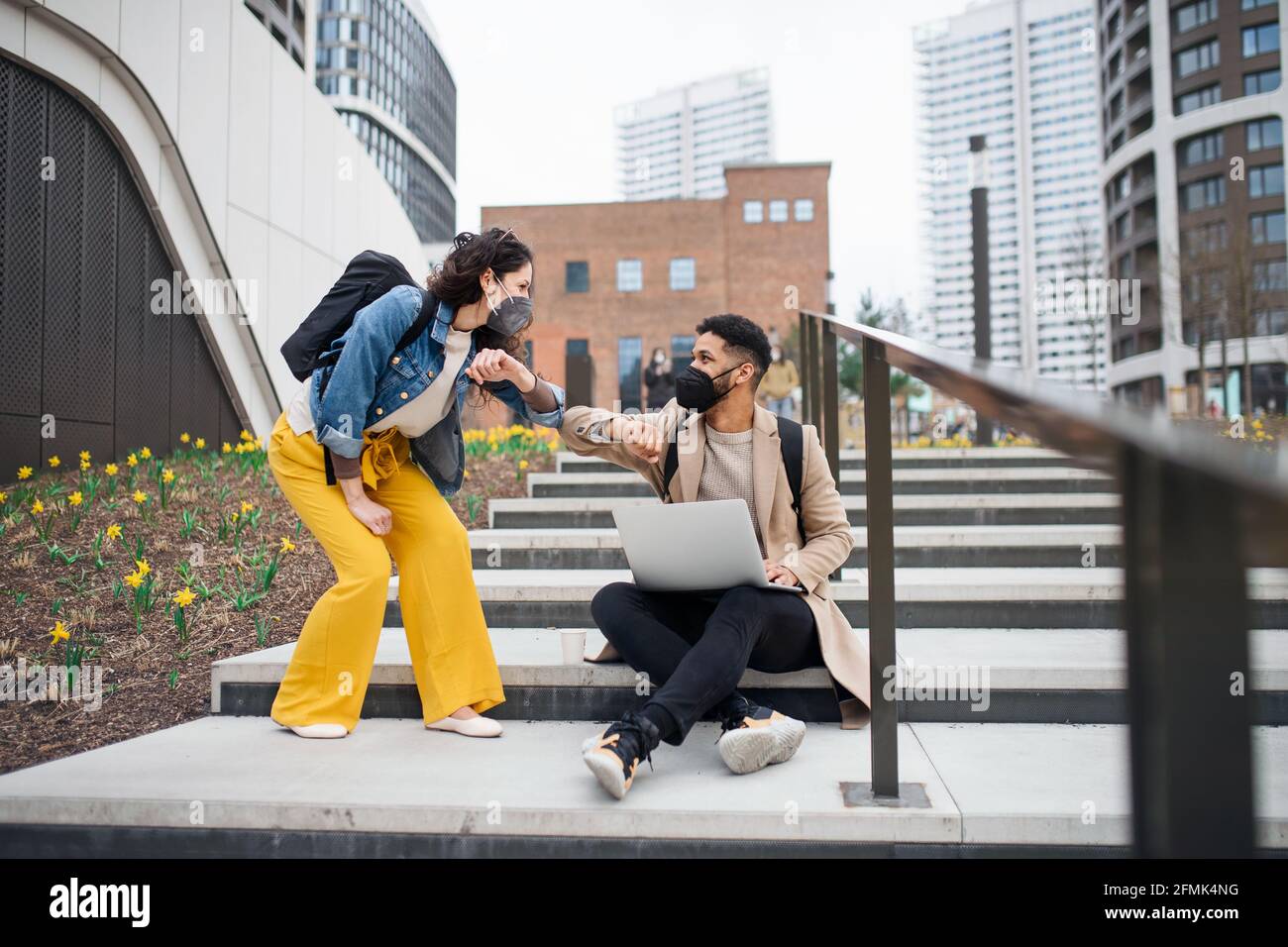 Man woman greeting friends hi-res stock photography and images - Alamy