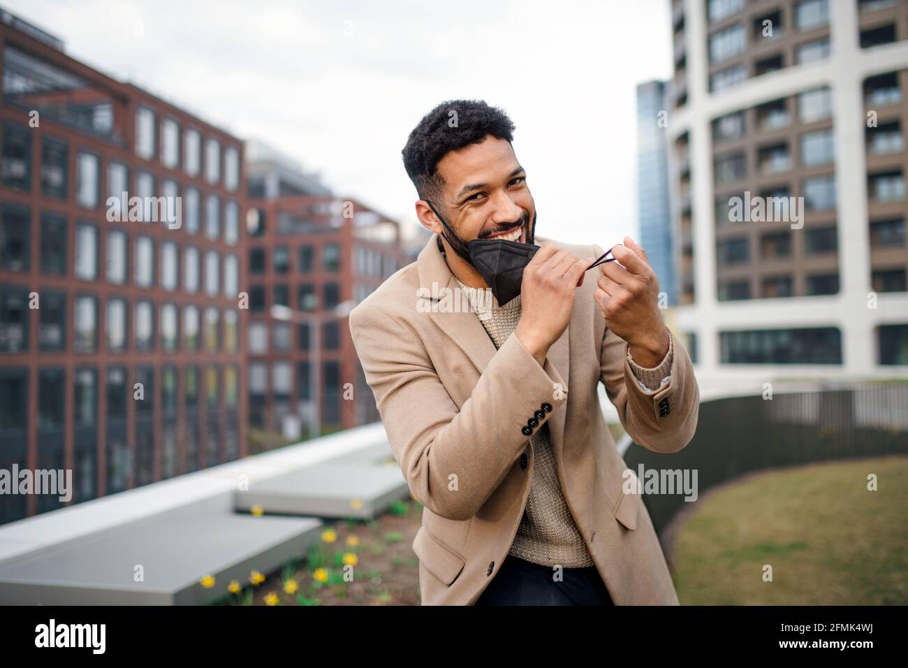 Man taking off mask hi-res stock photography and images - Alamy
