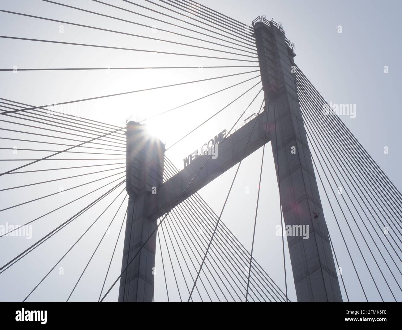 Low angle shot of the Vidyasagar Setu Bridge under the sunlight in ...