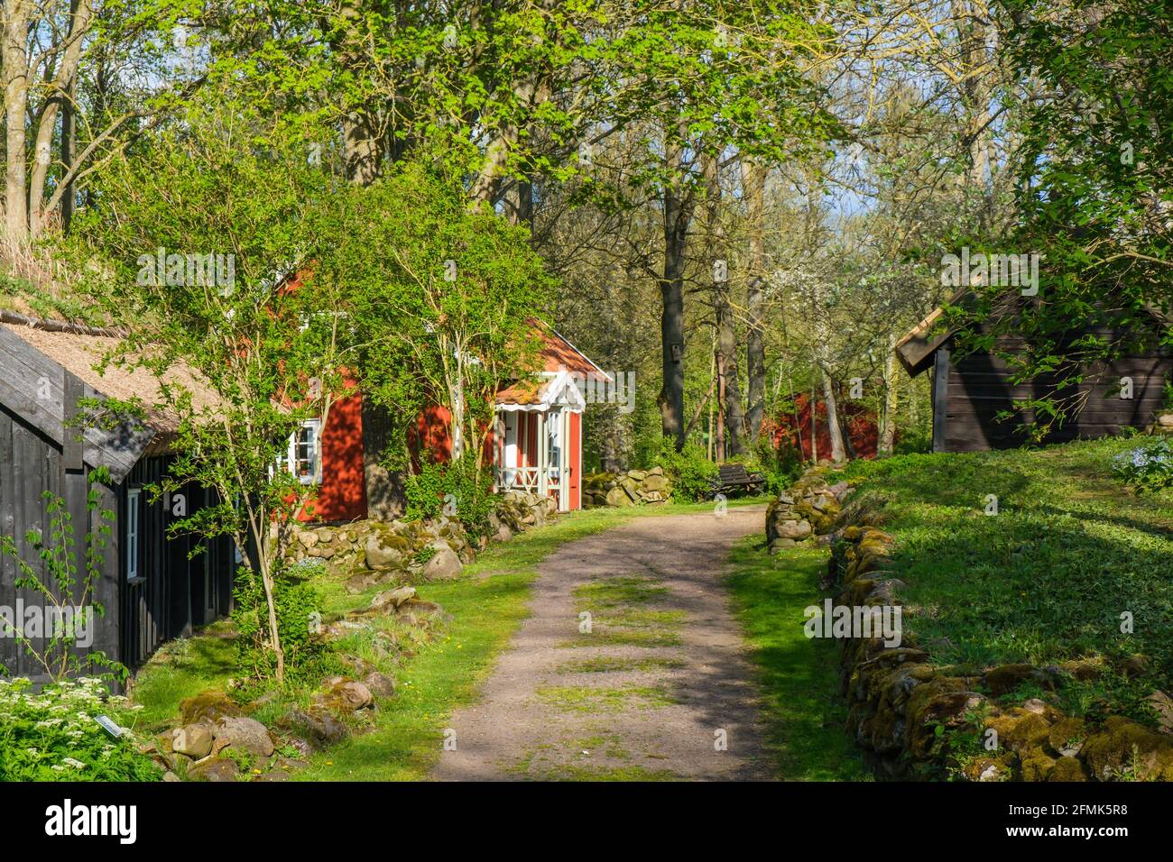 Idyllic red cottage porch hi-res stock photography and images - Alamy
