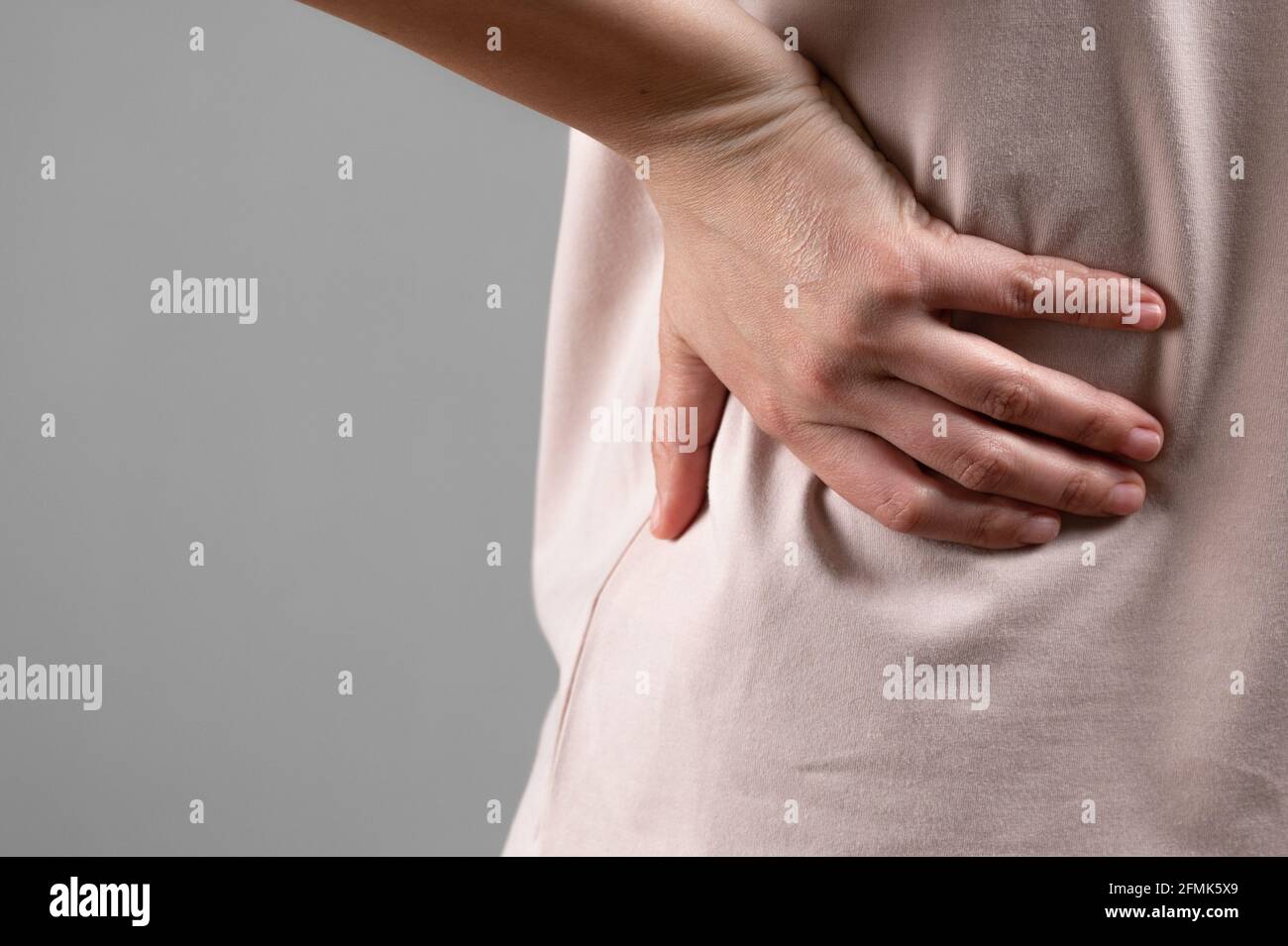 Image woman lower back pain hi-res stock photography and images - Alamy
