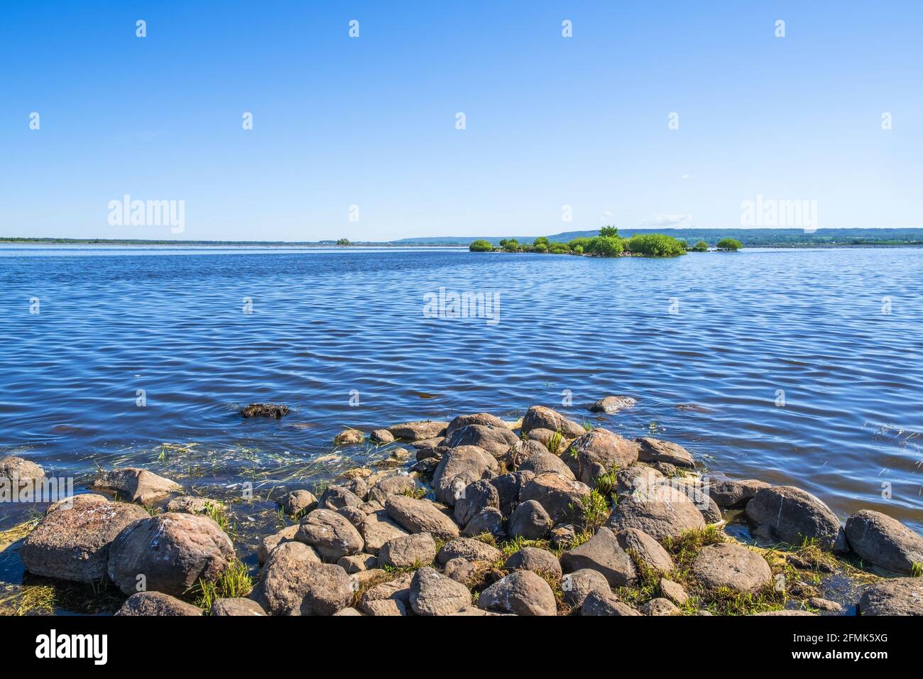 Calm lakeshore stones hi-res stock photography and images - Alamy