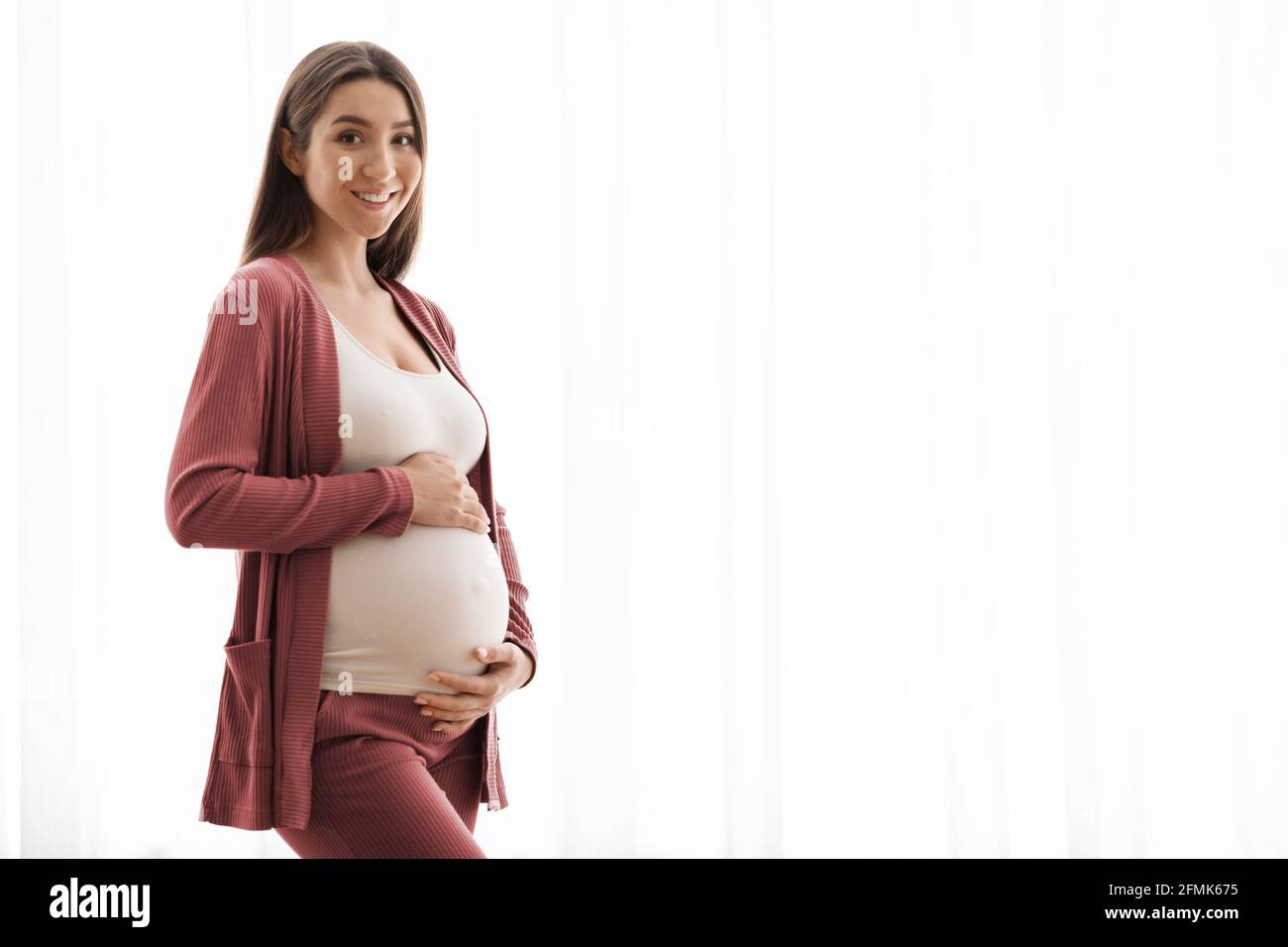 Healthy Pregnancy Concept. Portrait Of Beautiful Young Expectant Lady ...
