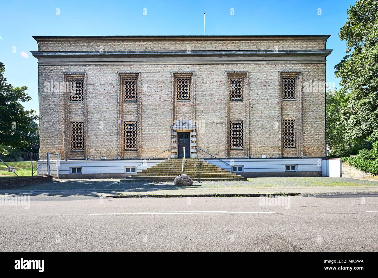 old square building surrounded by tress and nature Stock Photo - Alamy