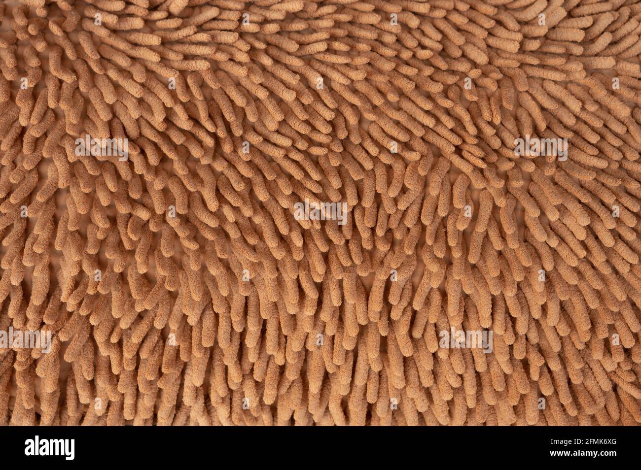 Texture of bumpy brown carpet, close up Stock Photo - Alamy
