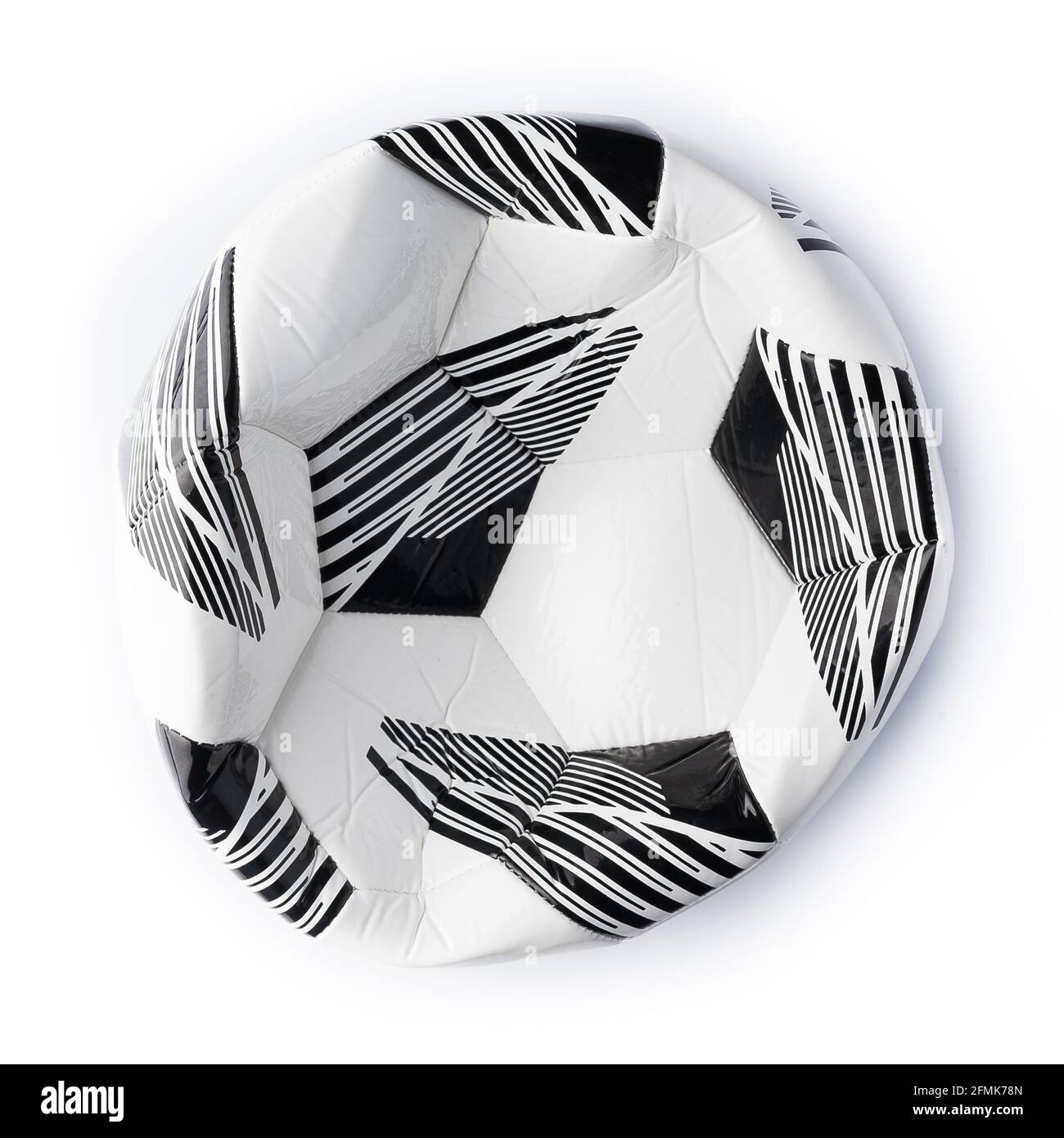 Deflated soccer, football ball on a white background Stock Photo - Alamy