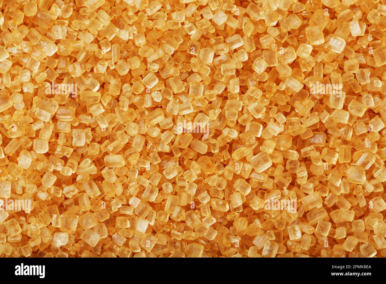Texture of golden sand on the beach with a solid background in full ...