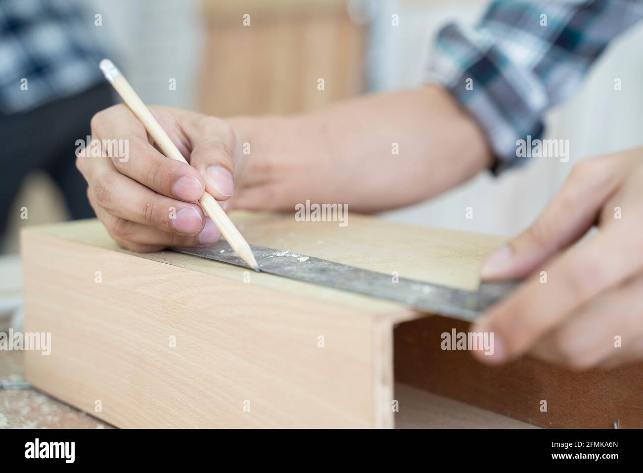 Carpenter working,hammer,meter on construction background Stock Photo ...