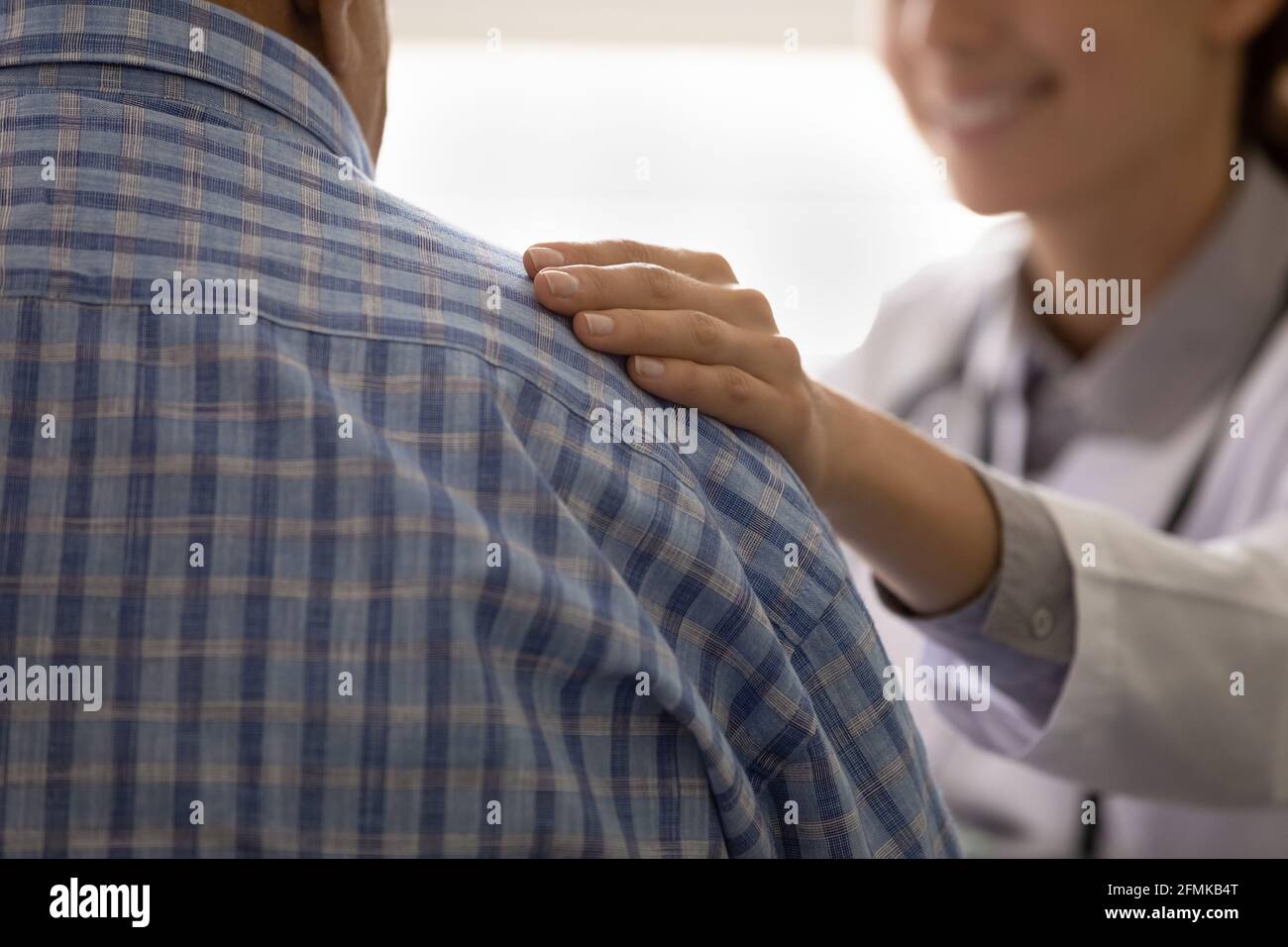 Caring clinic worker comfort anxious sick man patient inspire optimism ...