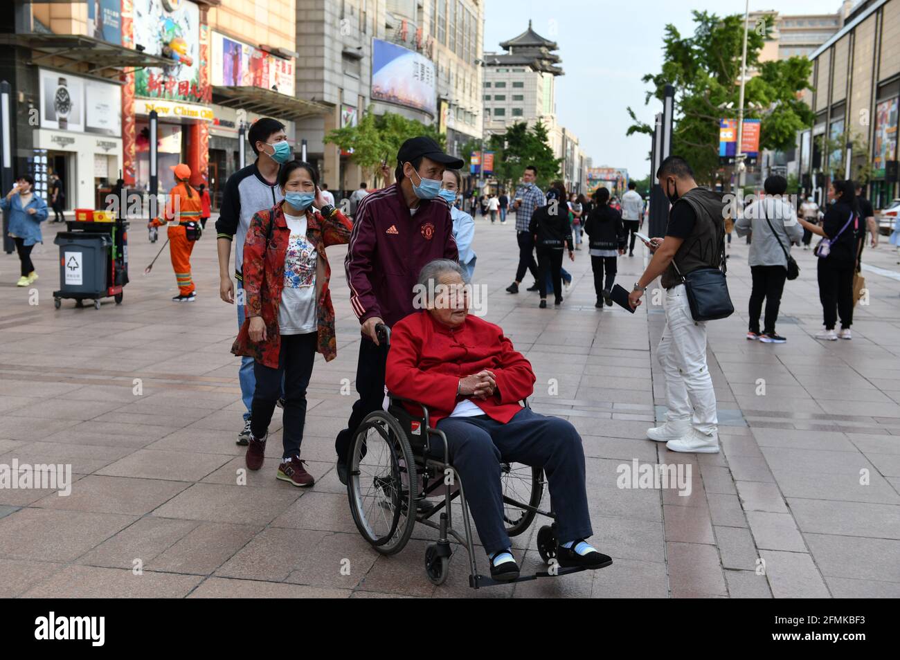 BEIJING, CHINA - MAY 10, 2021 - People visit the Wangfujing pedestrian ...