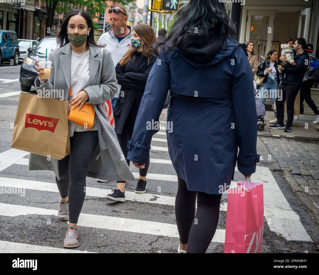 Shopper with her Leviâ€™s purchases in the Soho neighborhood of New ...
