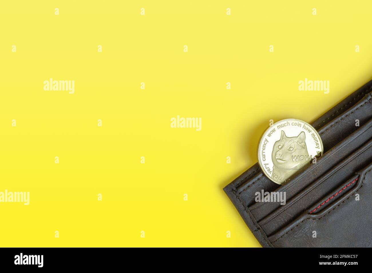 Dogecoin or Doge crypto currency coin with dog's face in brown leather ...