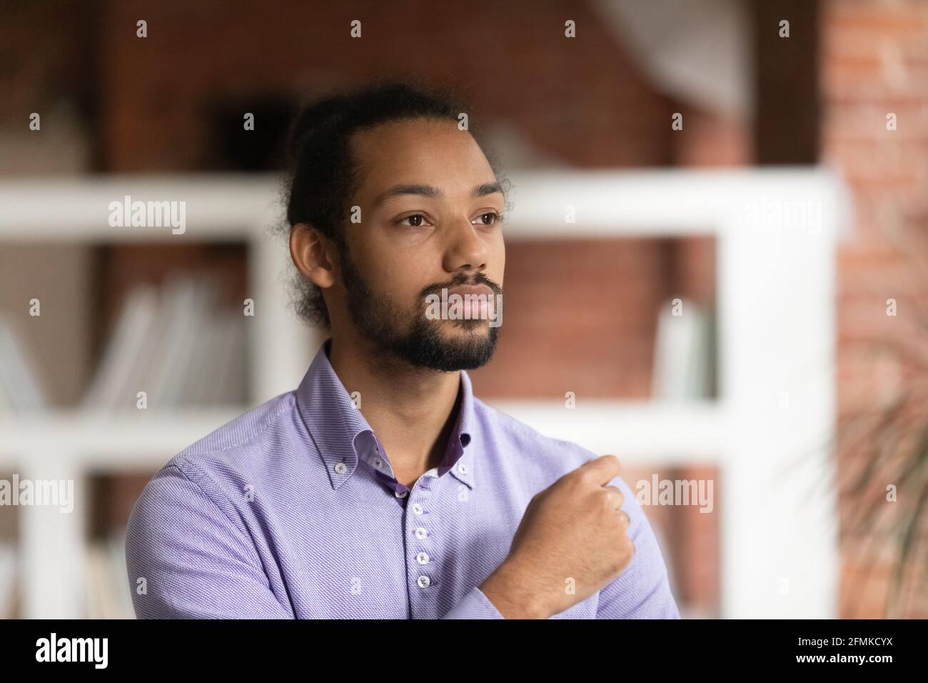 Head shot close up dreamy African American businessman visualizing ...