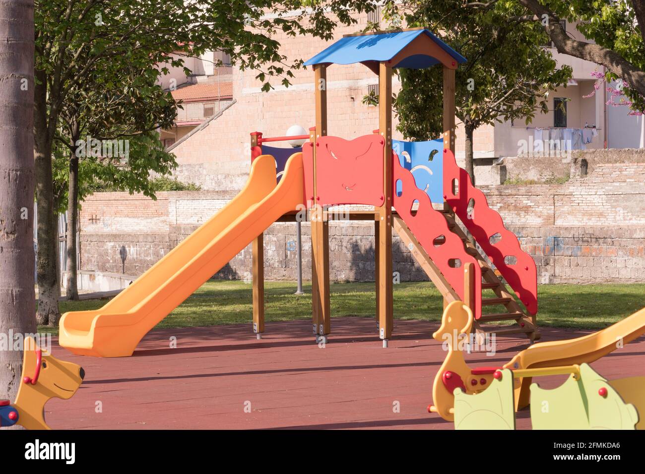 Empty children playground area Stock Photo - Alamy