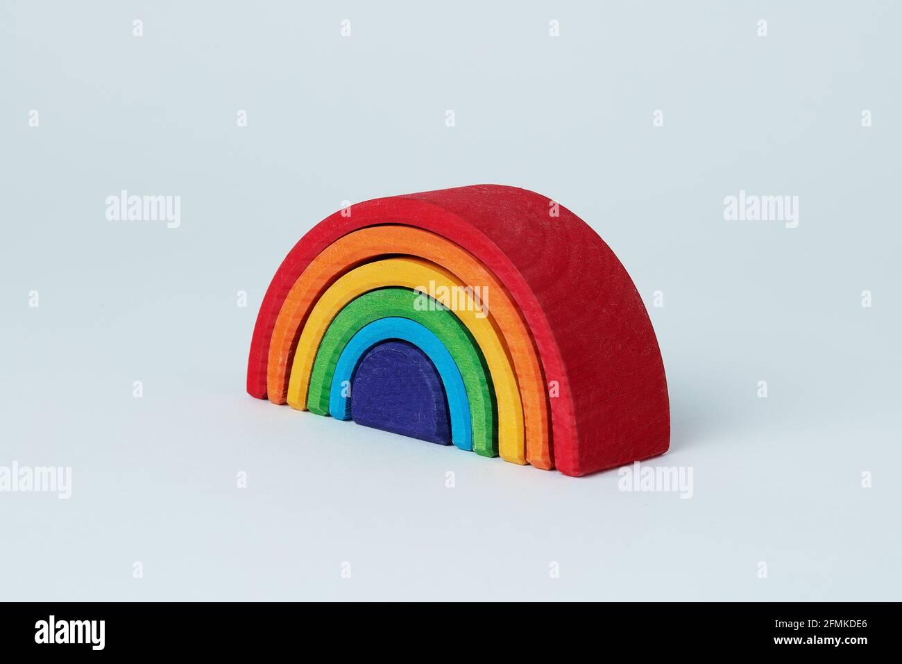 toy wooden rainbow puzzle Stock Photo - Alamy