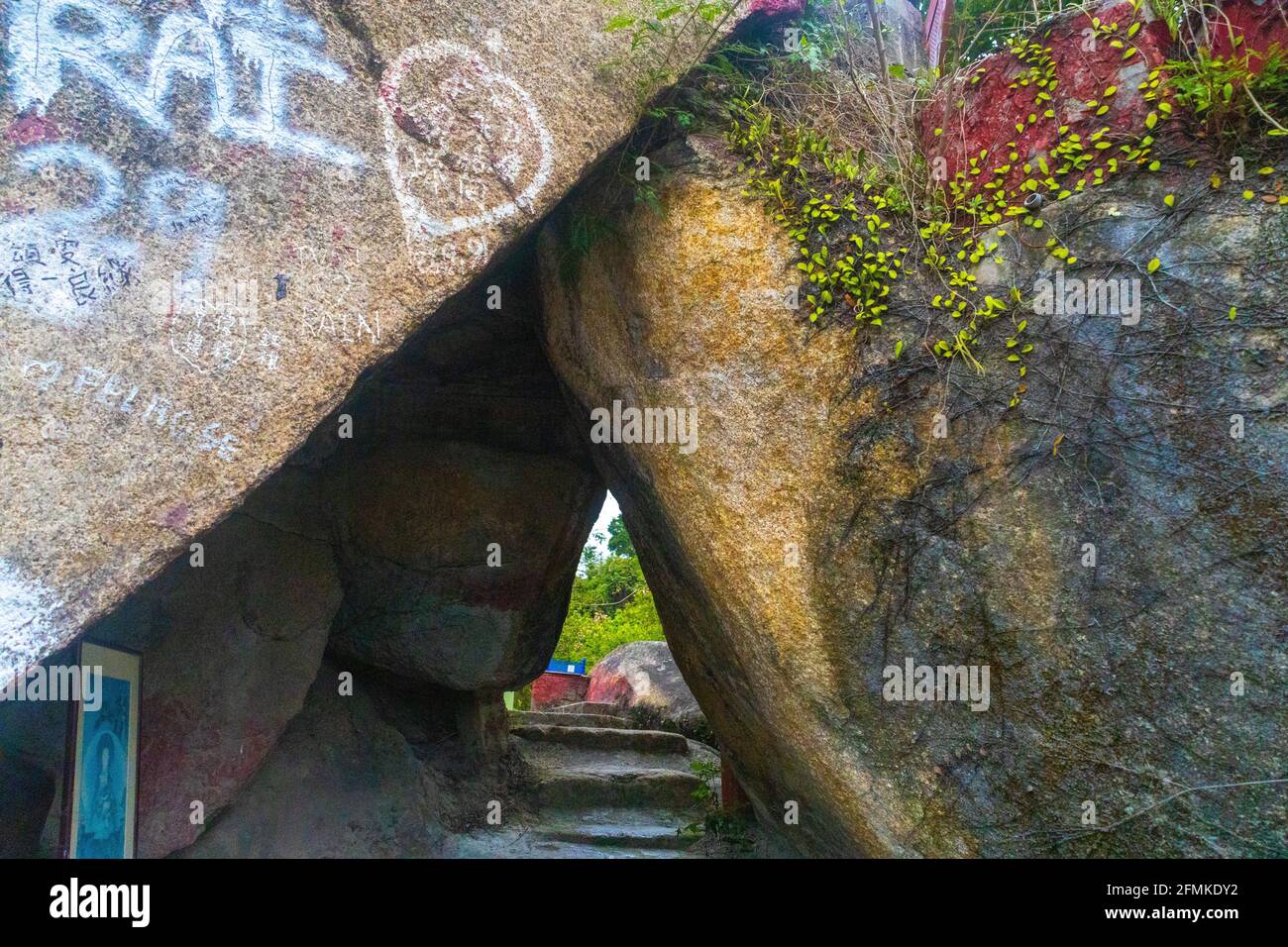 The backside of the hole underneath Lovers Stone, with some graffiti ...