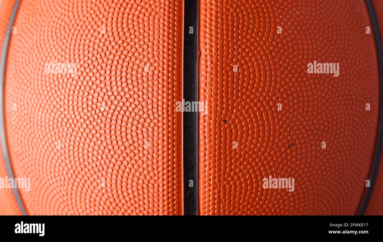Basketball rubber orange ball close-up texture background Stock Photo ...
