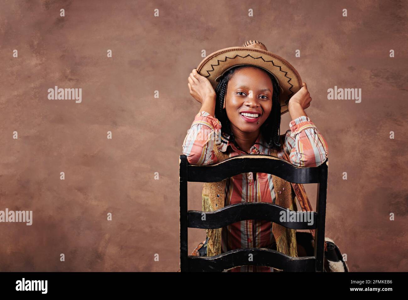 portrait of happy african american girl wearing cowboy hat Stock Photo ...