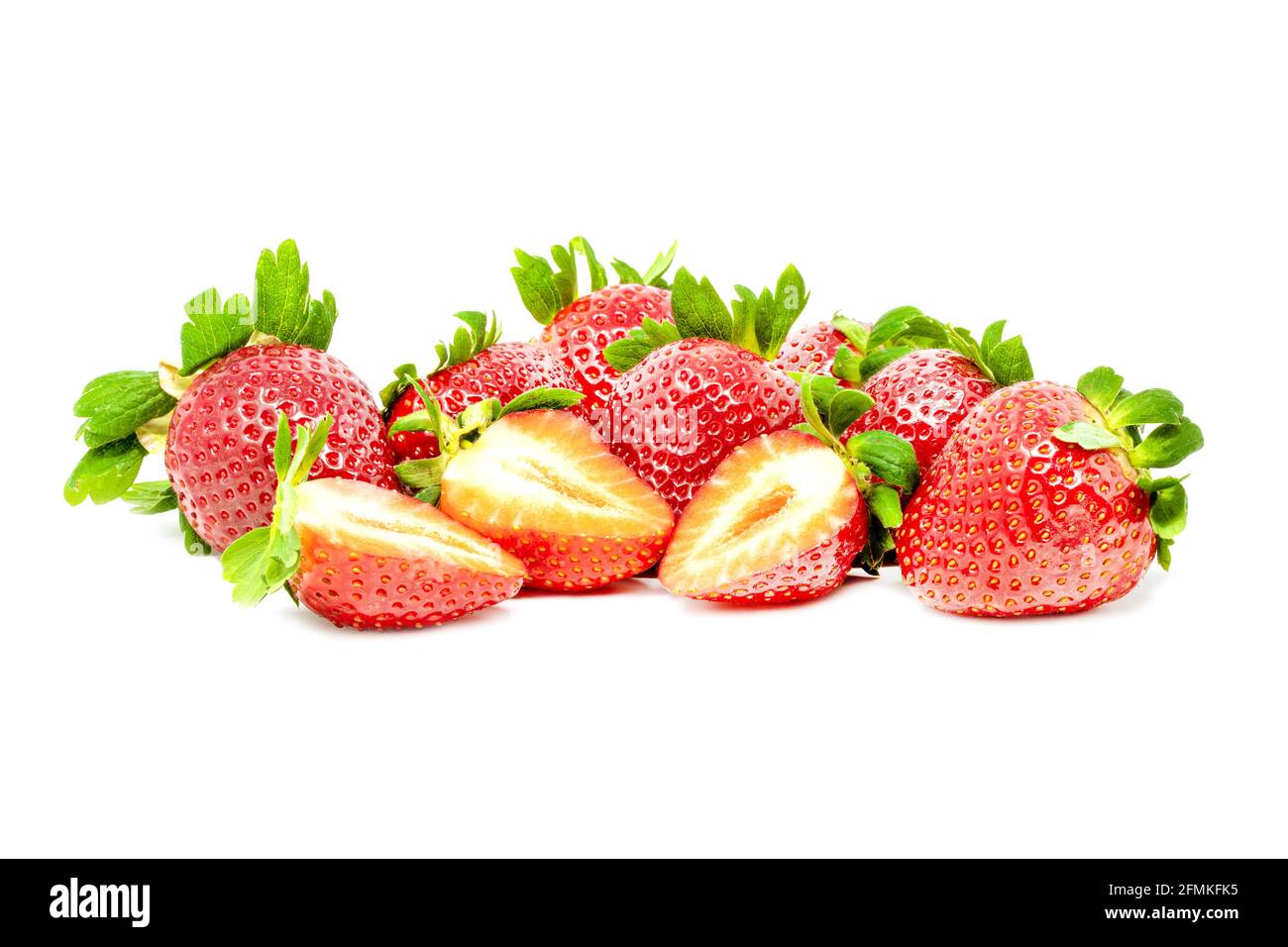Large group of fresh retouched perfect strawberries whole and cut on ...