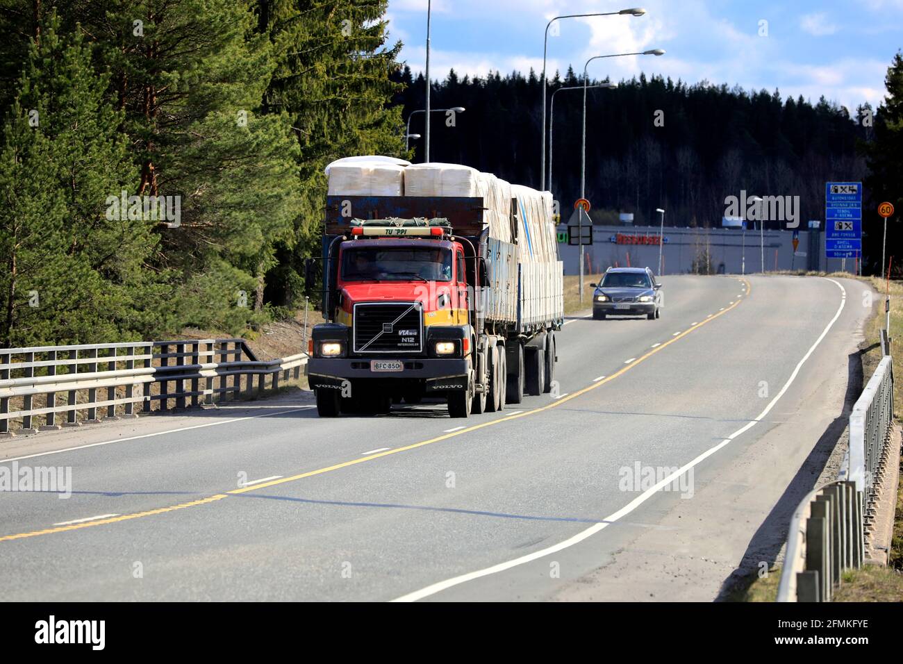 Classic conventional Volvo N12 VTA 8X2 truck pulling loaded full ...