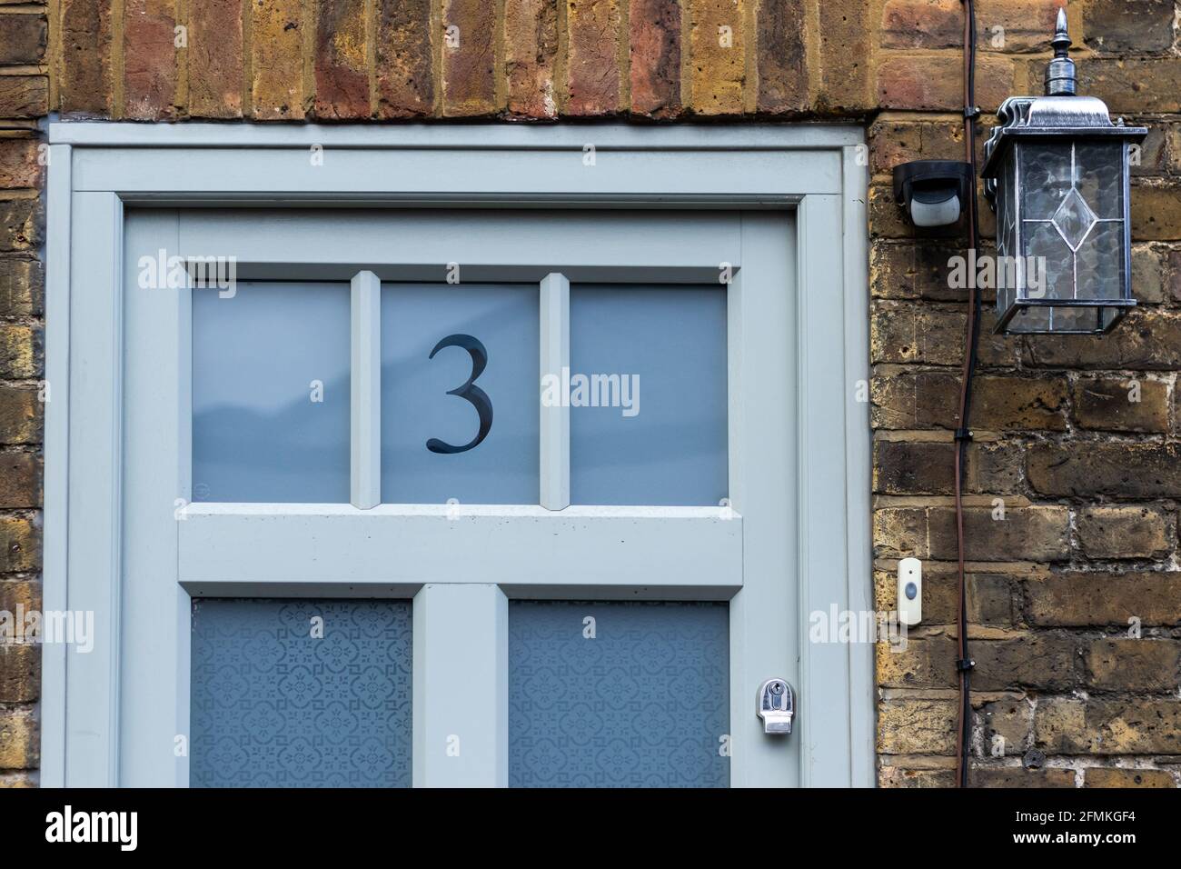 House door number 3 in large with letterbox Stock Photo - Alamy