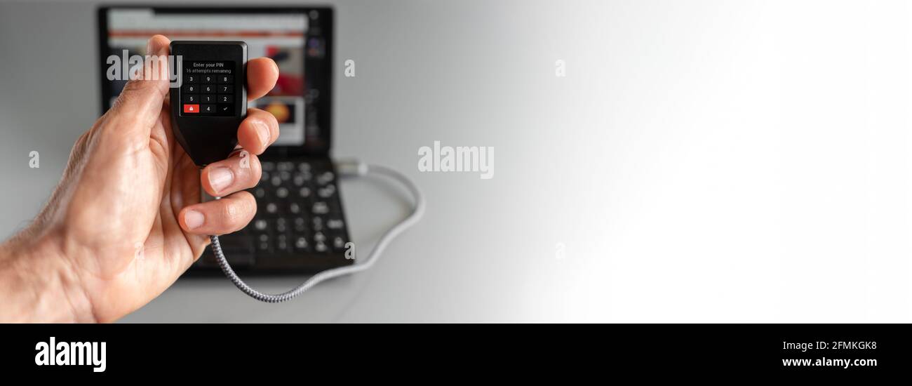 Digital wallet asking for pin with laptop and white background for text ...