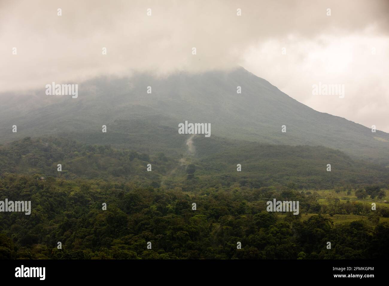 Arenal volcano and arenal cloud forest in the mist in Arenal region ...