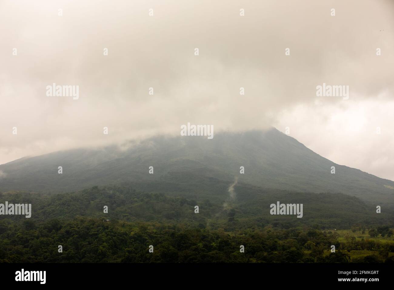 Arenal volcano and arenal cloud forest in the mist in Arenal region ...