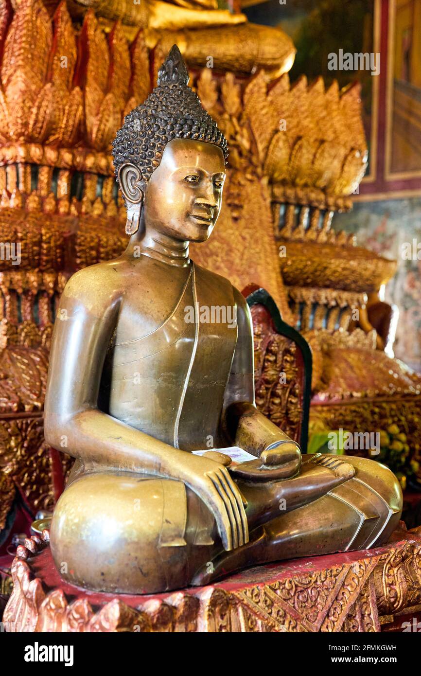 The golden interiors of the Wat Phnom Temple in Phnom Penh, Cambodia ...