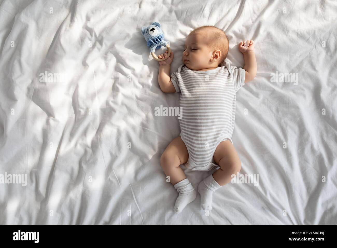Portrait Of Adorable Little Newborn Boy Or Girl Sleeping On Bed With ...