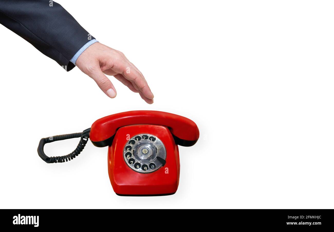 hand holding a red phone on isolated white background Stock Photo - Alamy
