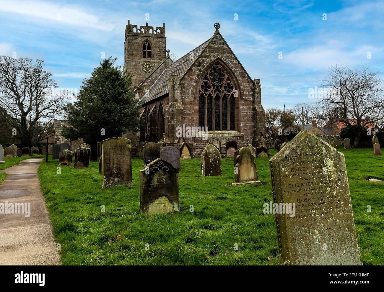 Graveyard in front of Holy Trinity church, Embleton, Northumberland ...