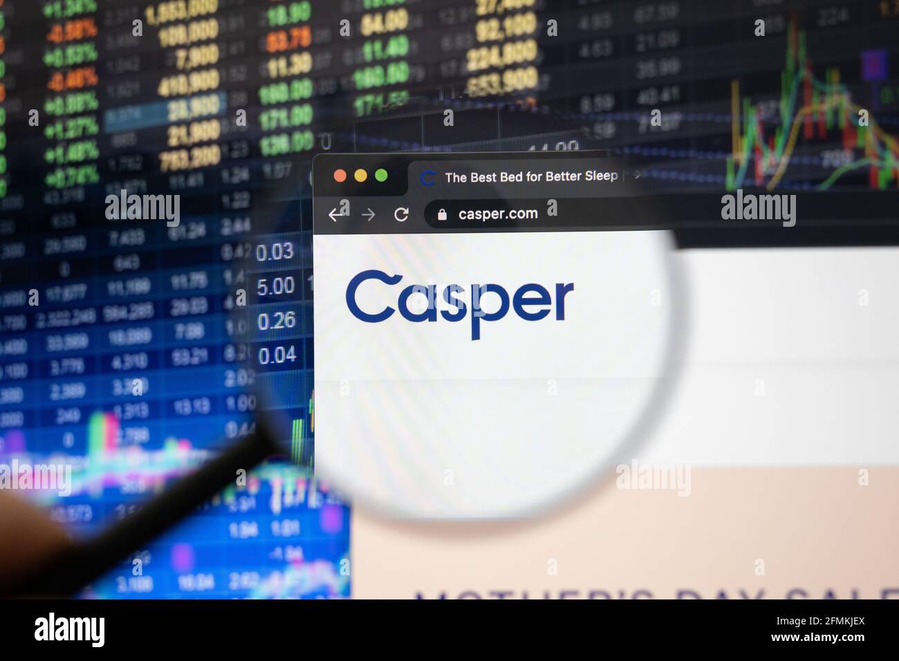 Casper company logo on a website with blurry stock market developments ...