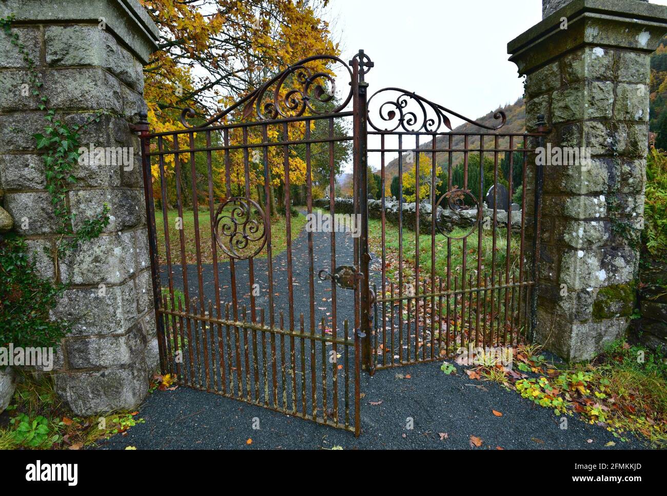 Metal Gates With Stone Columns