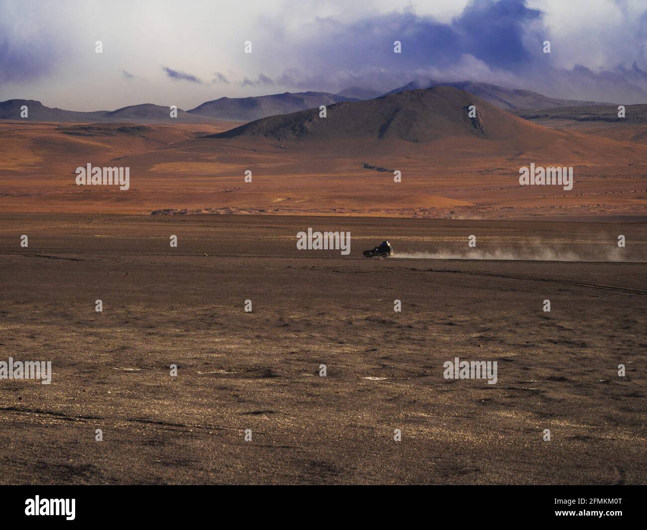 Jeep SUV car transportation vehicle driving through Altiplano Andes ...