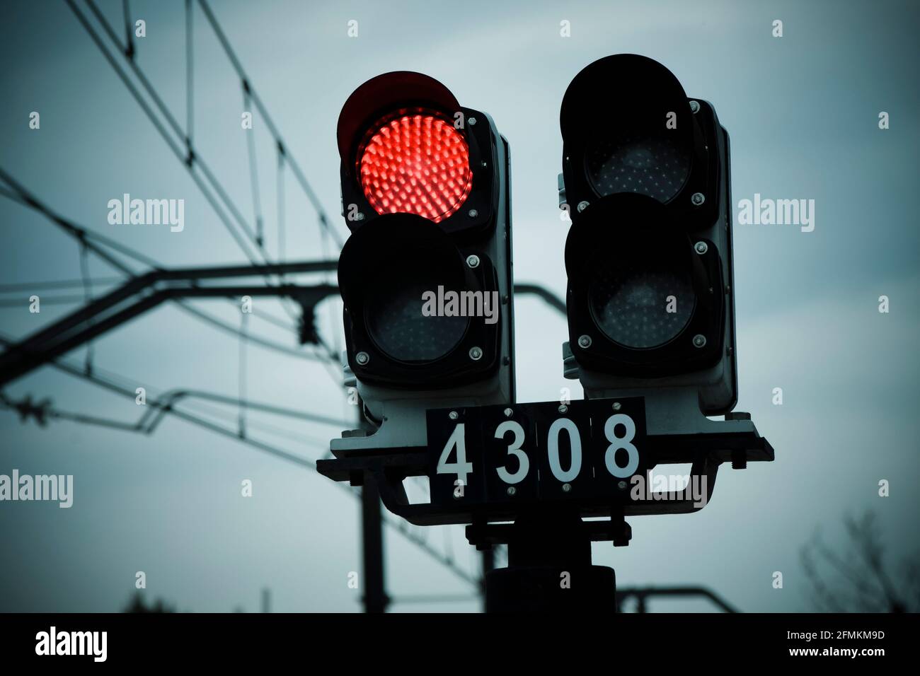 Red traffic light on a train line Stock Photo - Alamy