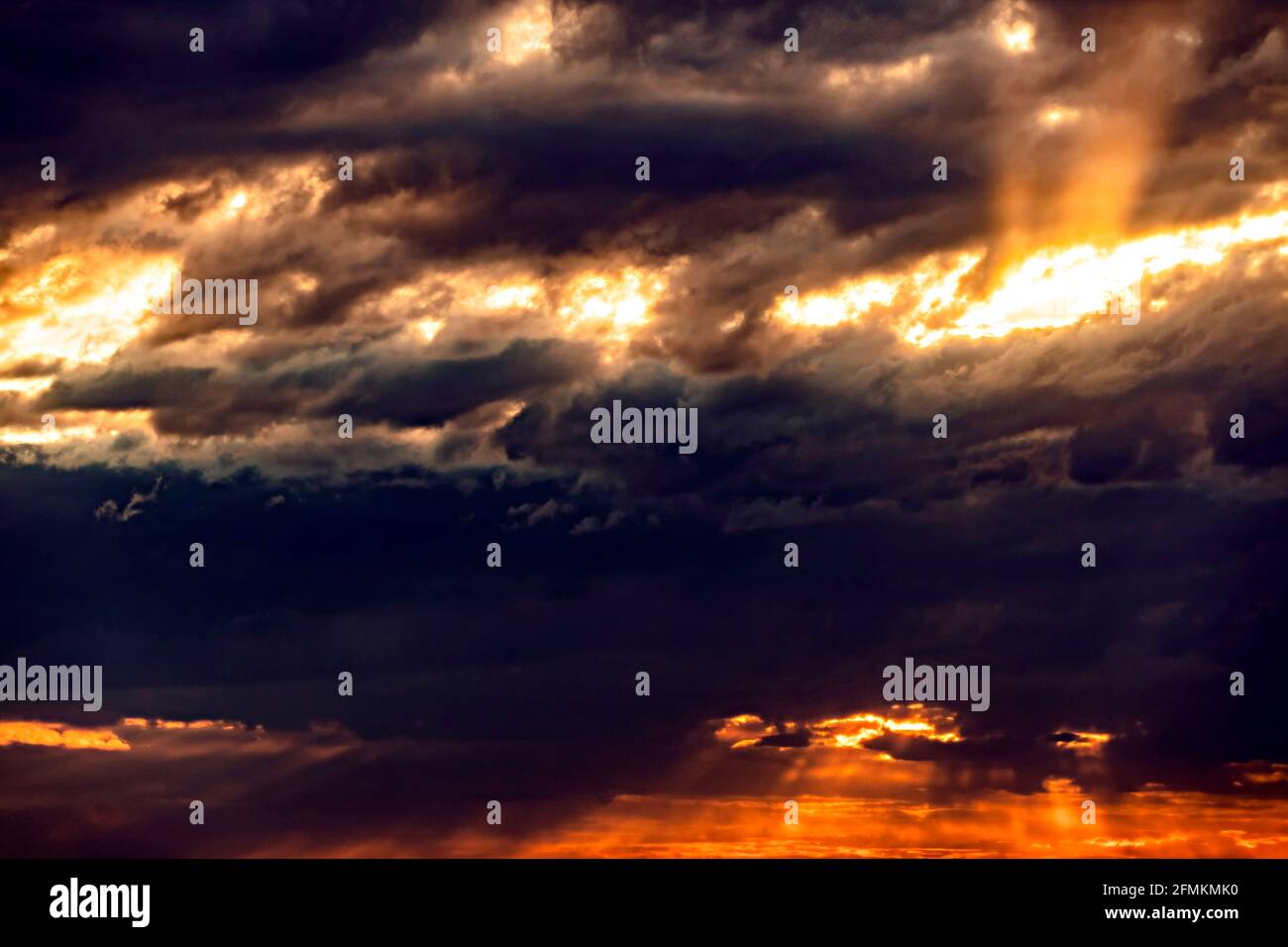 The heavenly light of the sun.Dramatic evening sky with clouds and rays ...