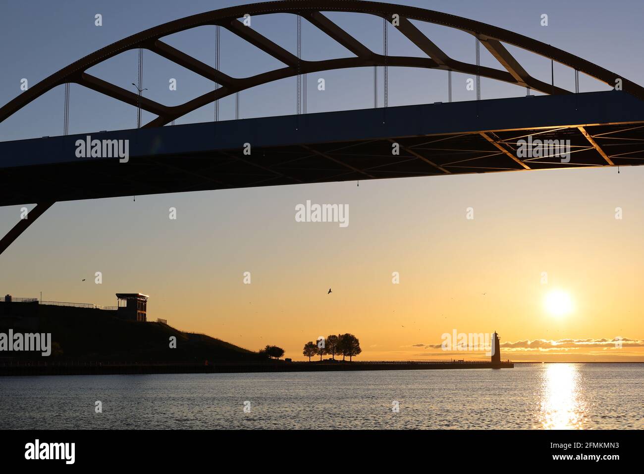 Sunrise in the Port of Milwaukee Stock Photo - Alamy