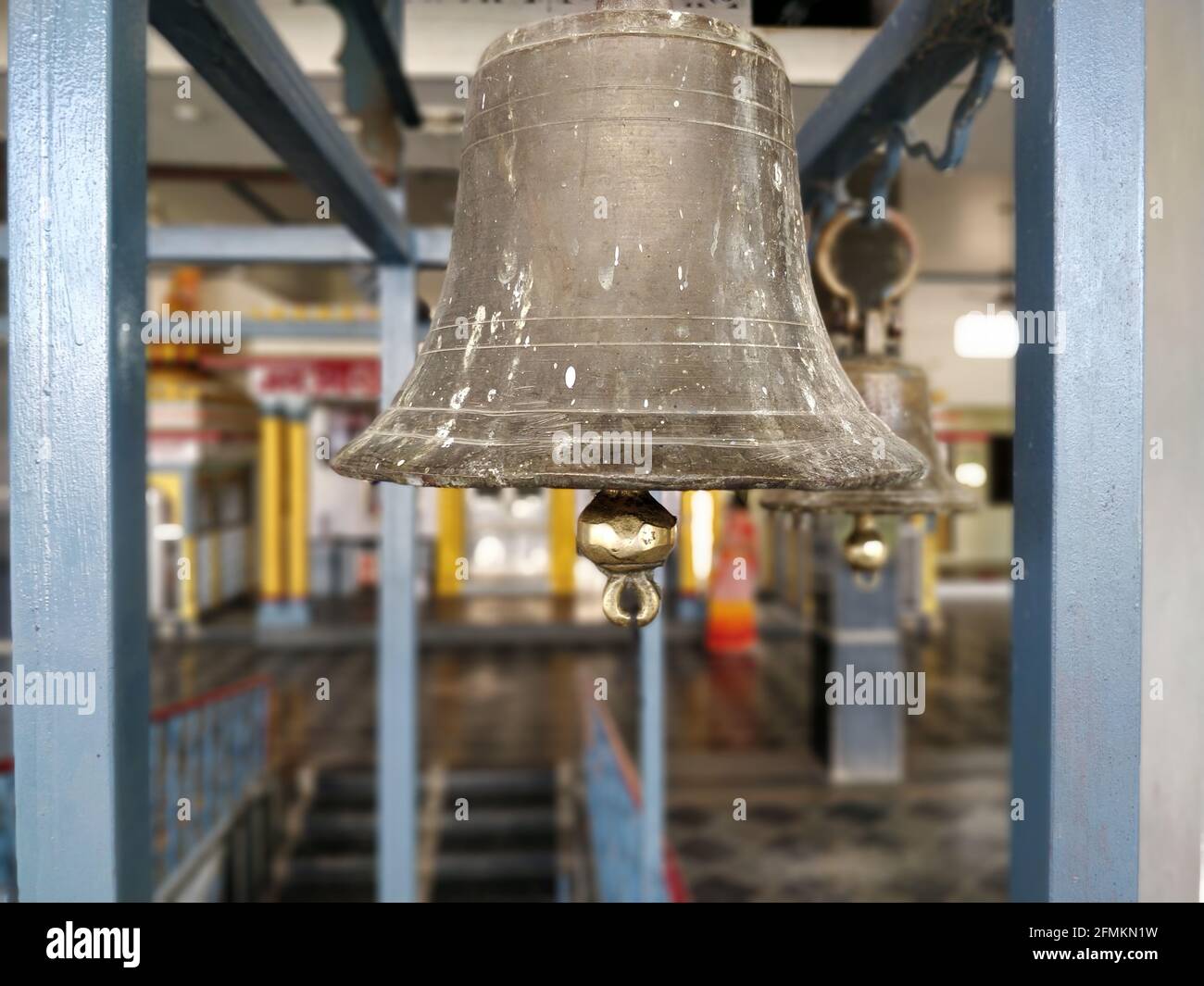 Closeup of a Hindu Temple Bell under the sunlight in Rajasthan, India ...