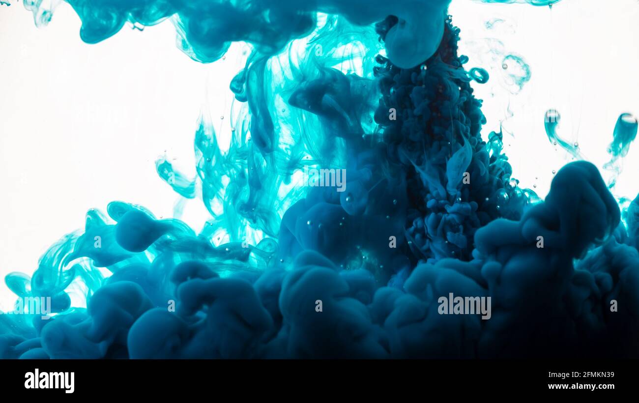 Ink in water. Abstract background. Ink swirling in water. Ink in water ...