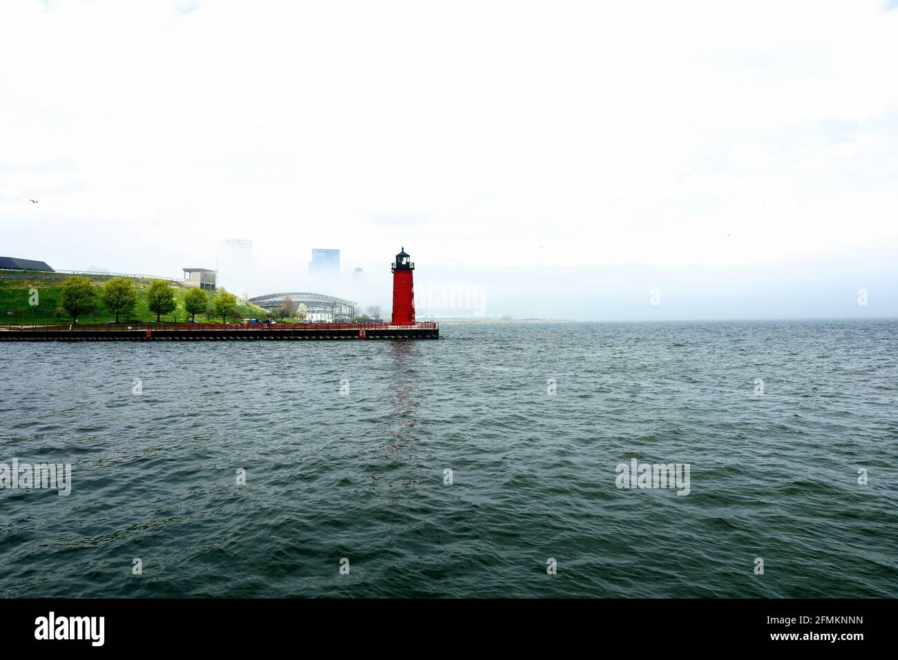 Port of Milwaukee, looking out to Lake Michigan with Lighthouse and ...