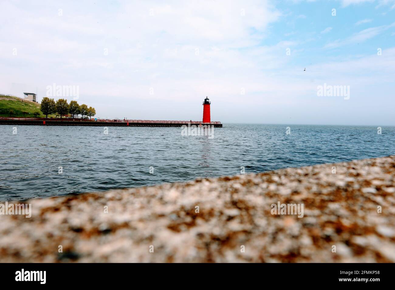 Port of Milwaukee, looking out to Lake Michigan with Lighthouse and ...