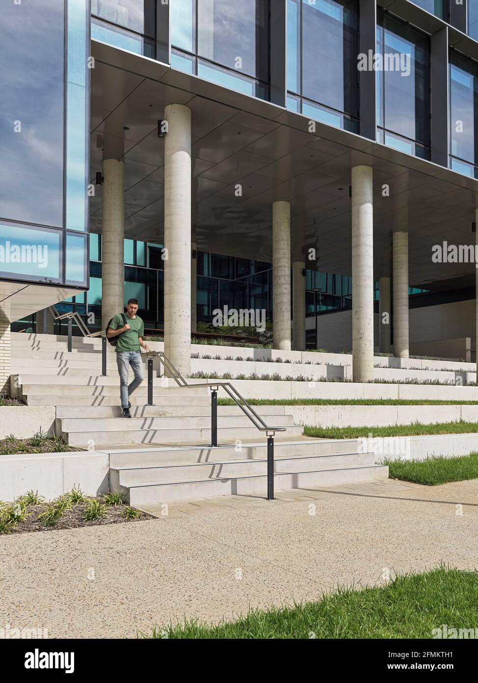 Bleachers beneath building canopy. ANU Research School of Social ...