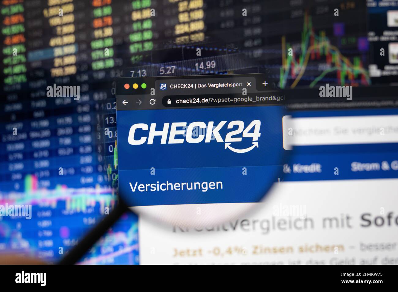 Check24 company logo on a website with blurry stock market developments ...